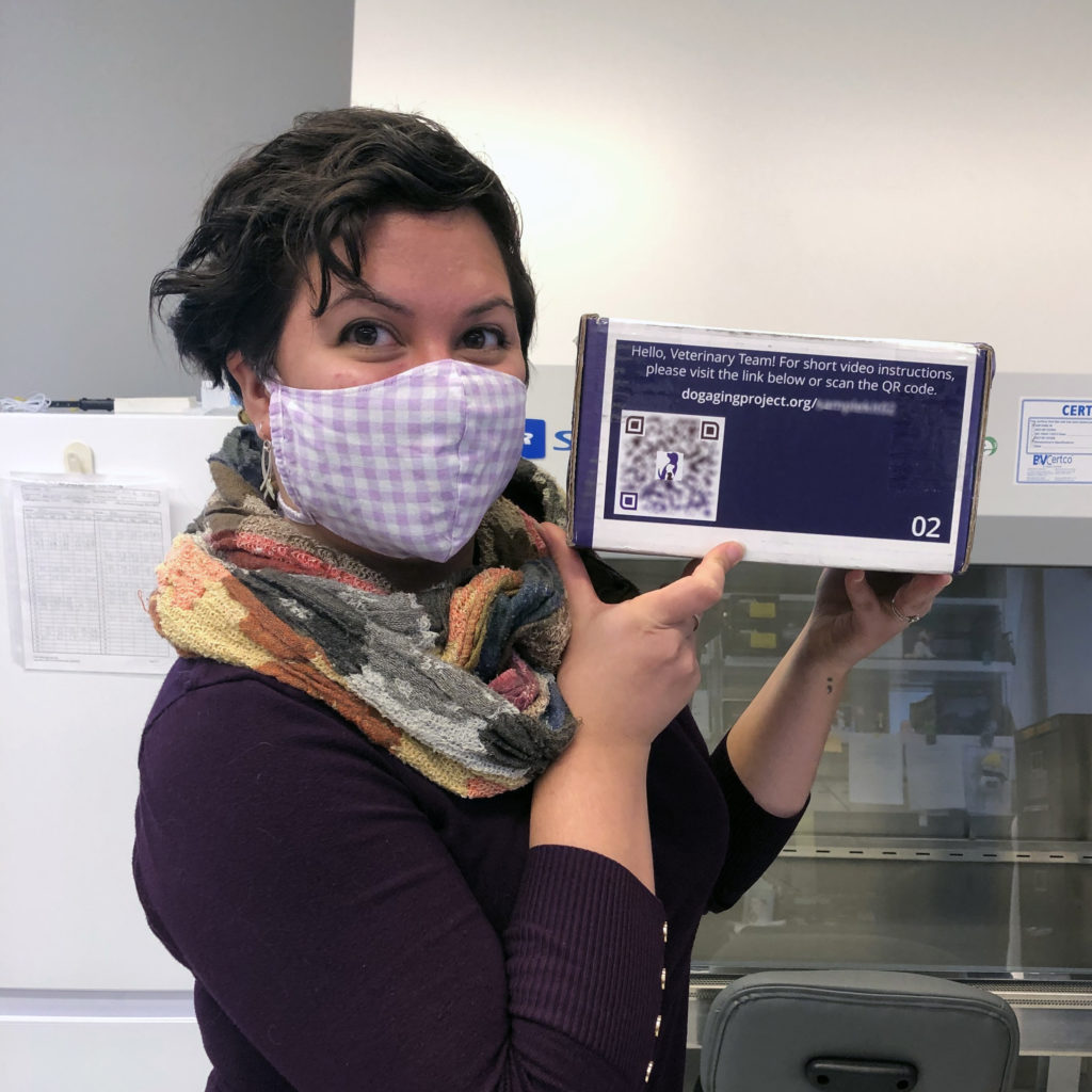 Dr Lara Mouttham receiving a sample kit at the Cornell Veterinary Biobank